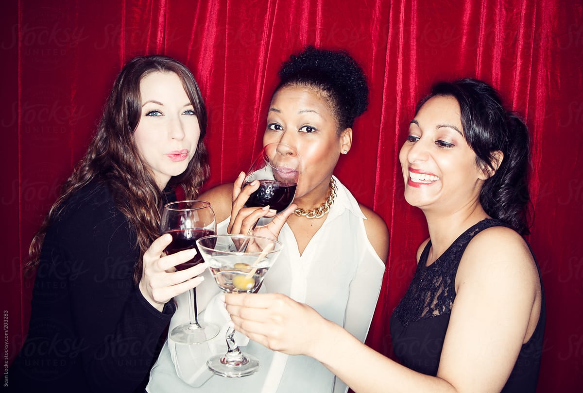 Portraits: Friends Toast Together At Party Photo Booth - Stock Image ...