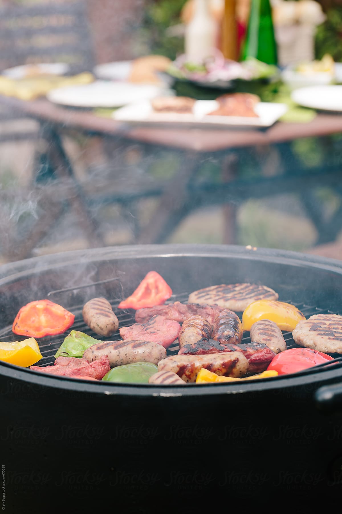 "Meat And Vegetables Being Grilled On A Charcoal Barbecue Outdoors" by ...