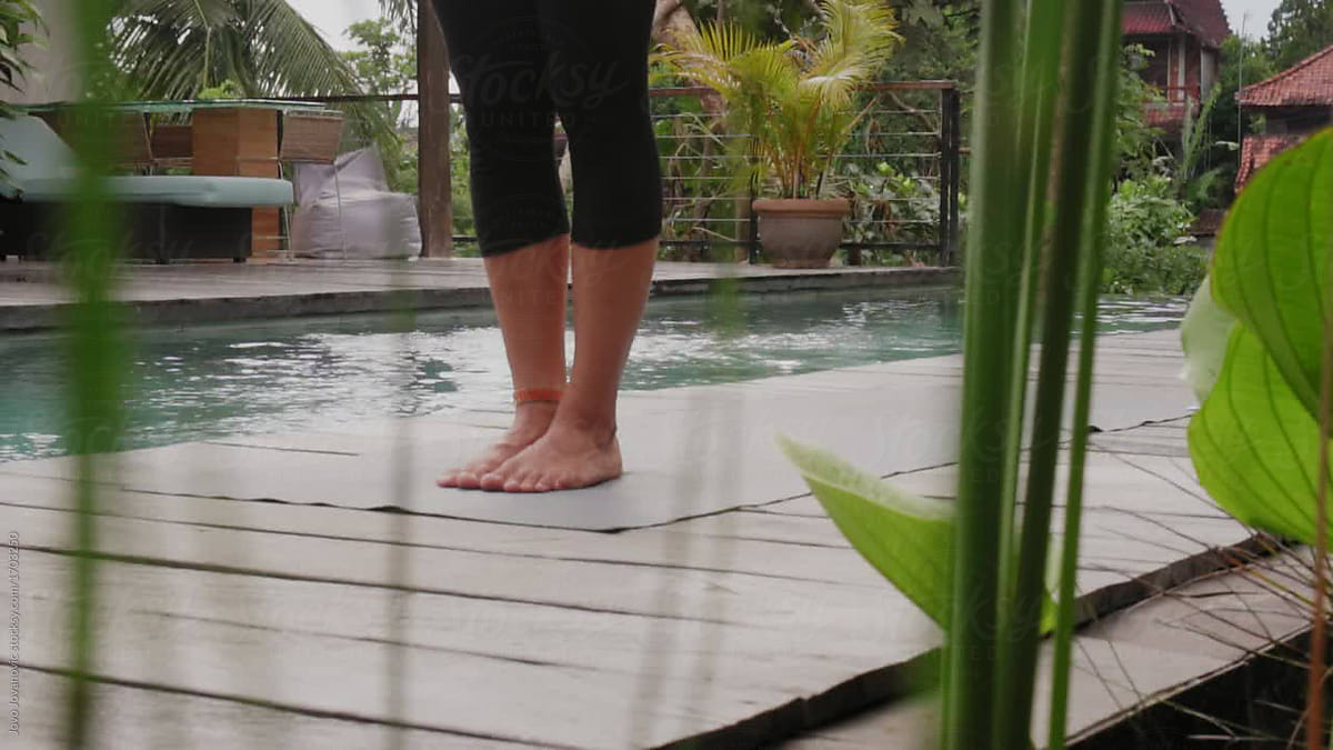 "Woman's Feet Stand Firmly On Yoga Mat" by Stocksy Contributor "Jovo ...