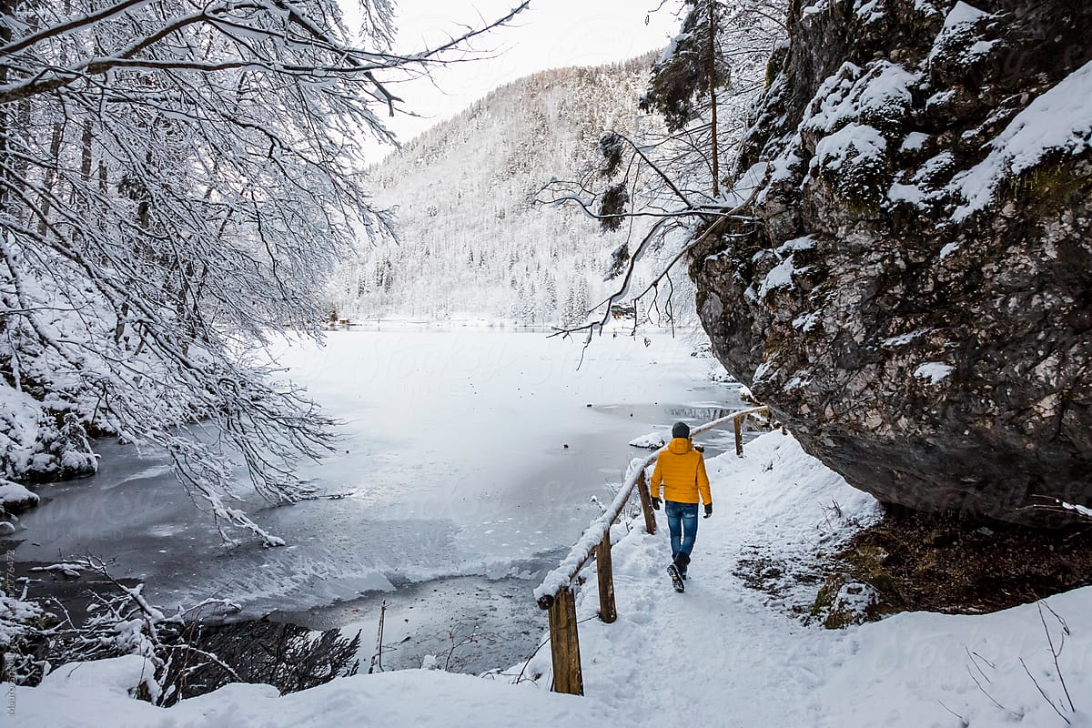 "Man Walking Alone On A Snowy Landscape" by Stocksy Contributor "Mauro ...