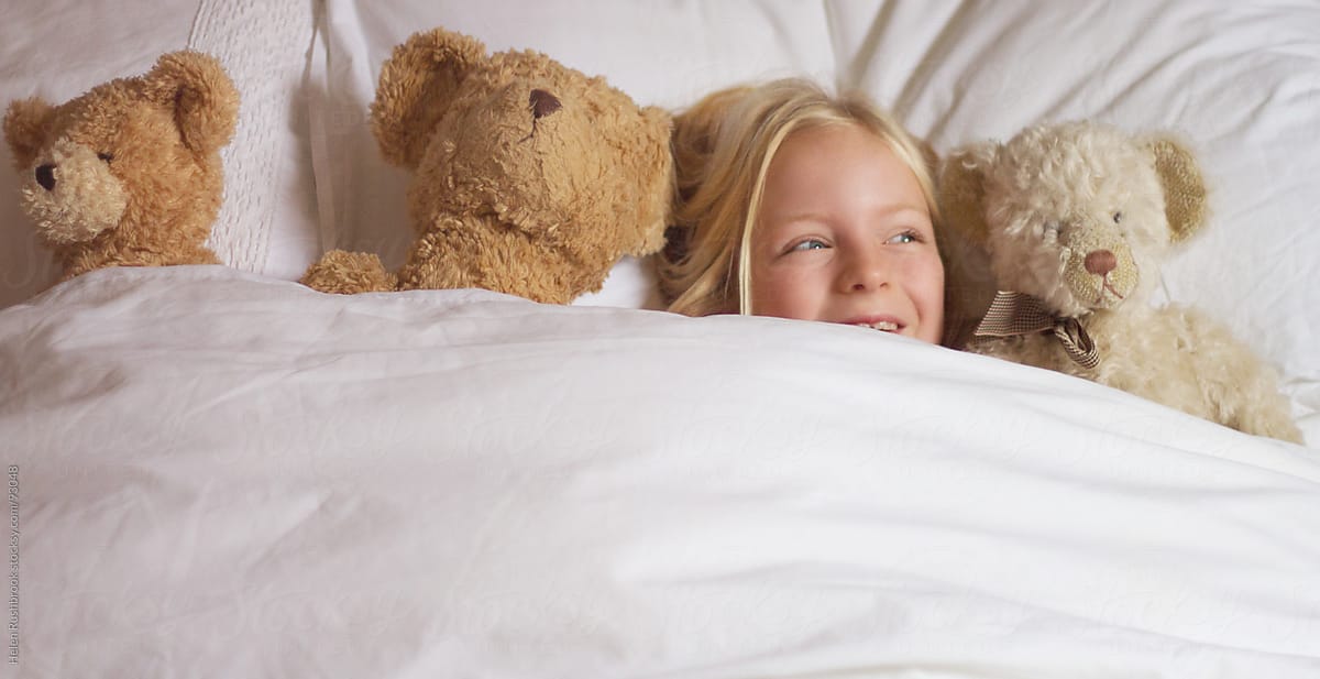 "A Little Girl In Bed With Her Teddy Bears." by Stocksy Contributor ...