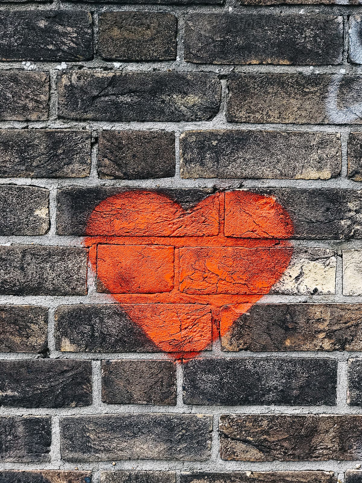 "Red Heart Painted On A Brick Wall" by Stocksy Contributor "Sam Burton ...