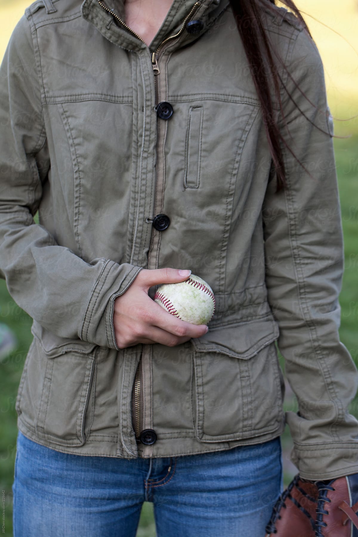 "Teenage Girl Playing Catch" by Stocksy Contributor "Jill Chen" - Stocksy