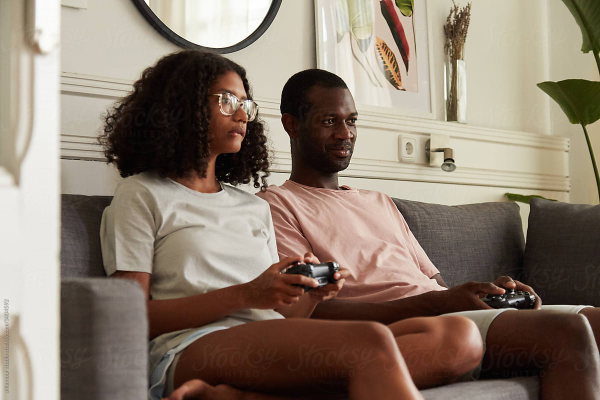 "Friends Gaming" by Stocksy Contributor "ohlamourstudio" - Stocksy