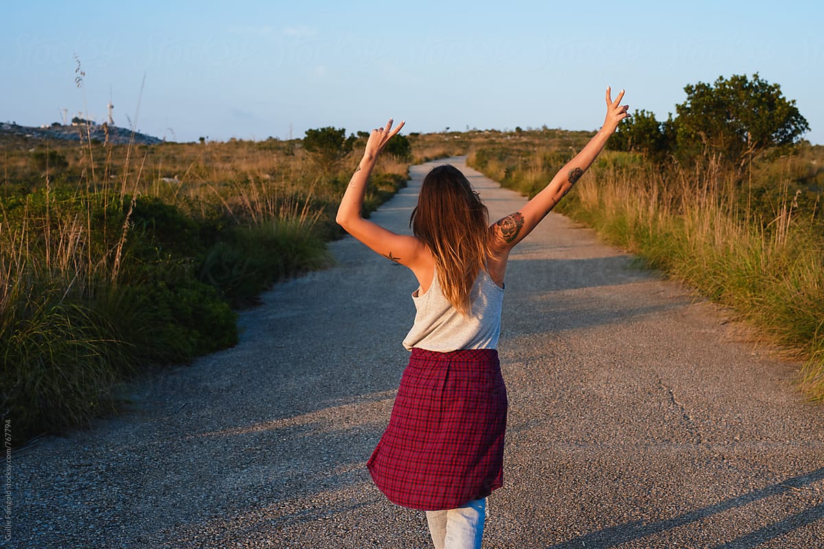 "Faceless Happy Girl Showing Victory Sign" by Stocksy Contributor ...
