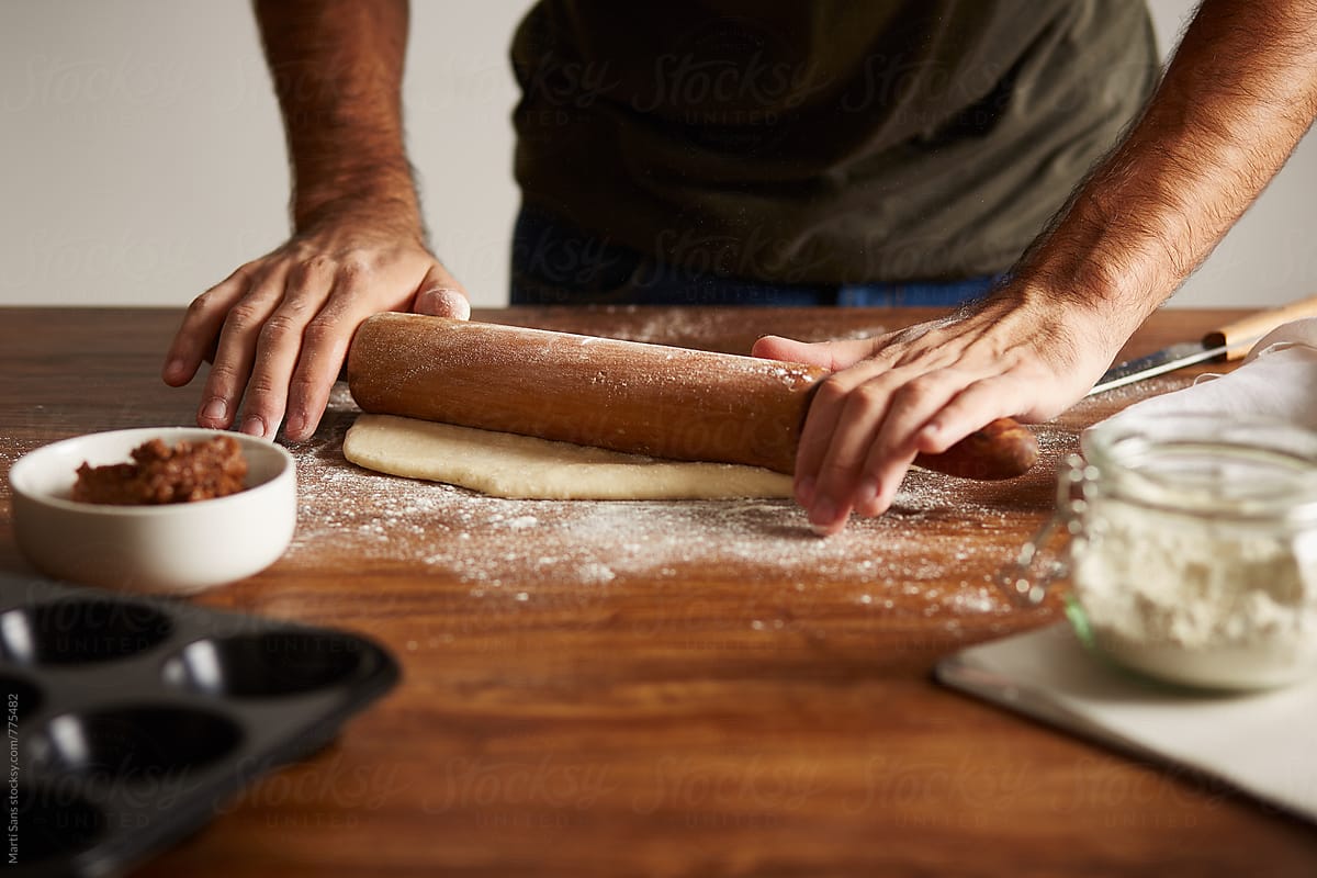 "Rolling Cinnamon Rolls" by Stocksy Contributor "Martí Sans" - Stocksy