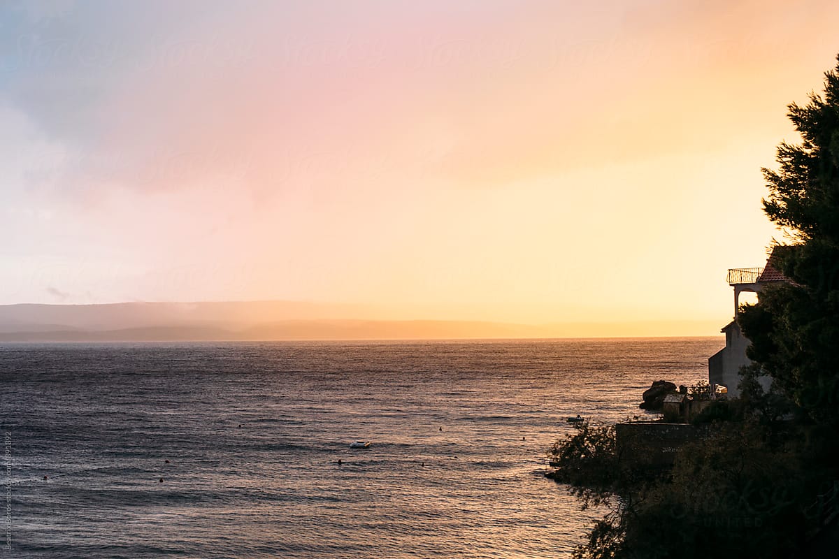 "Sunset Over The Sea After Bad Weather" by Stocksy Contributor "Beatrix ...