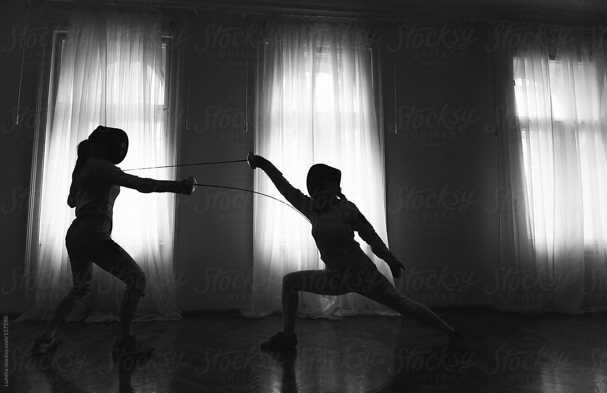 "Fencing Fight" by Stocksy Contributor "Lumina" - Stocksy