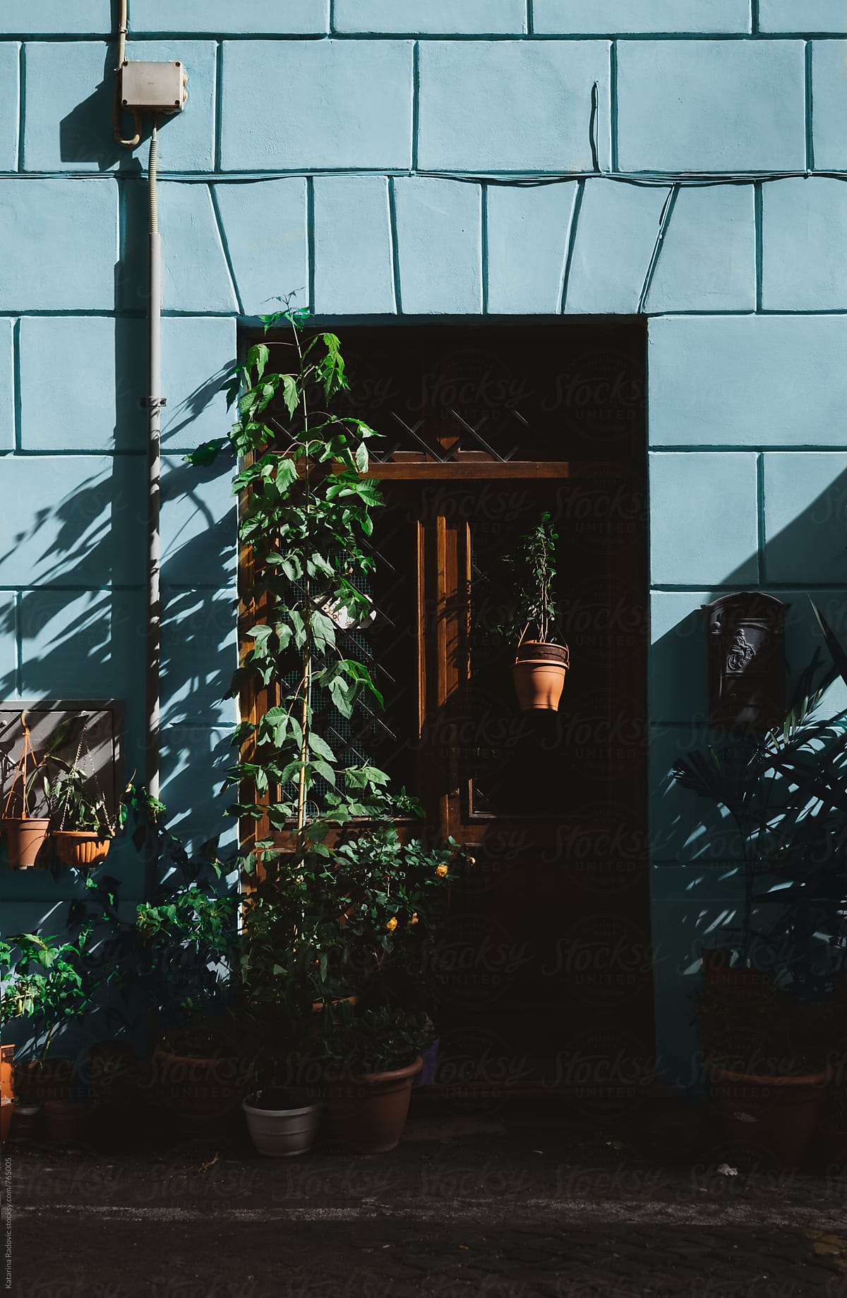 "Entrance Of The Blue Pastel House" by Stocksy Contributor "Katarina ...