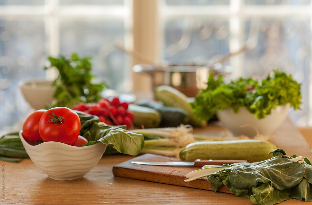 "Fresh Vegetables On A Kitchen Table" by Stocksy Contributor "Mosuno ...