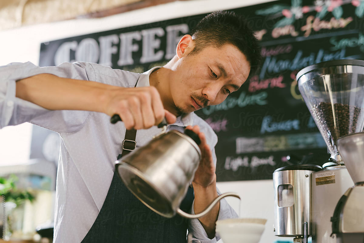 "Young Man Preparing Coffee" by Stocksy Contributor "MaaHoo" - Stocksy