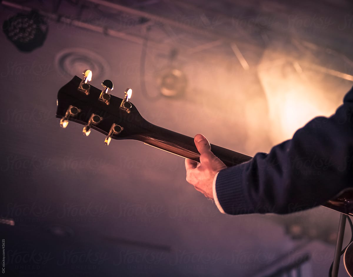 "Musician Playing Guitar During Live Concert" by Stocksy Contributor ...