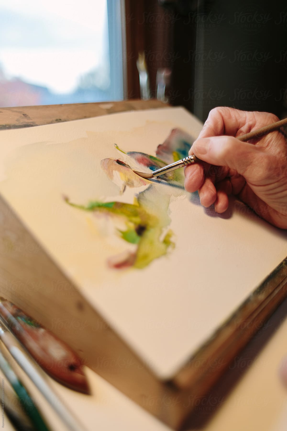 "Artist Hand" by Stocksy Contributor "Raymond Forbes LLC" - Stocksy
