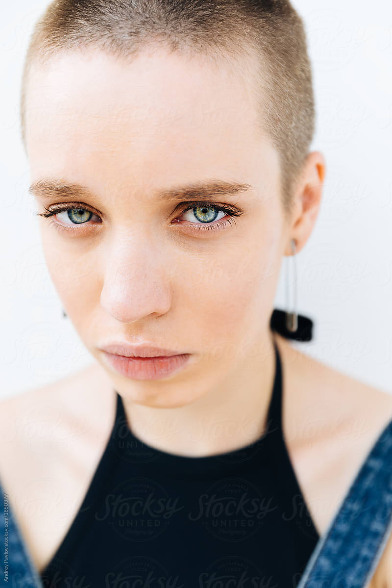 "Close Up Portrait Of A Stylish Woman With Crewcut Looking At Camera ...