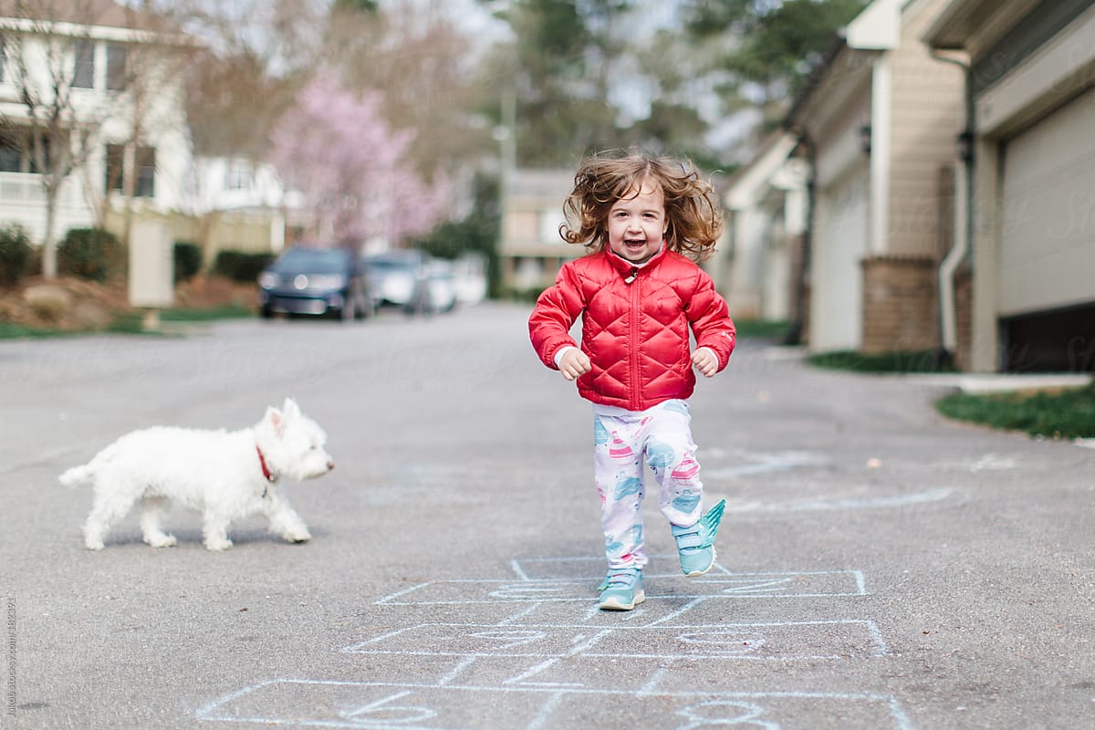"Cute Toddler Doing Hopscotch Outside" by Stocksy Contributor "Jakob ...