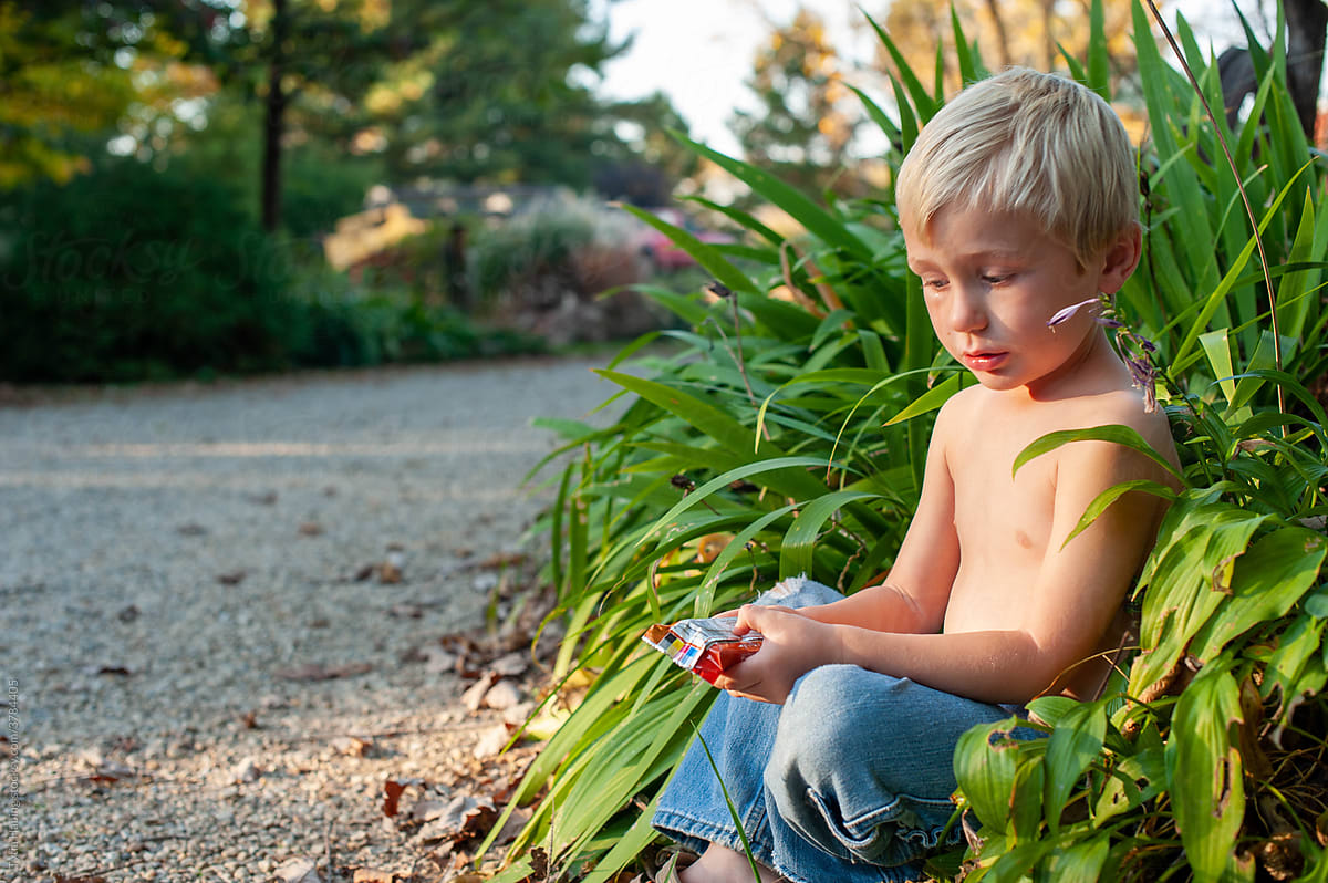 "Boy Sitting And Crying" by Stocksy Contributor "Tytia Habing" - Stocksy