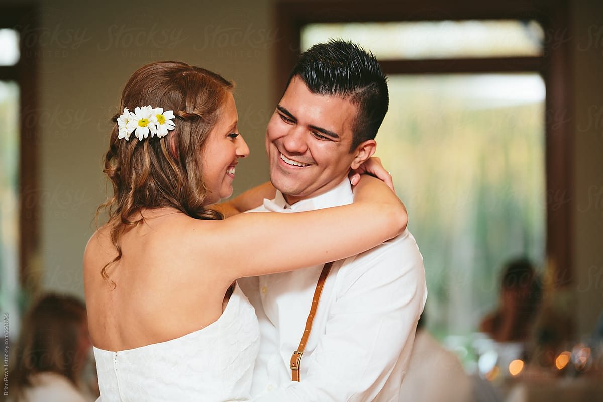"Bride And Groom At First Dance" by Stocksy Contributor "Brian Powell ...