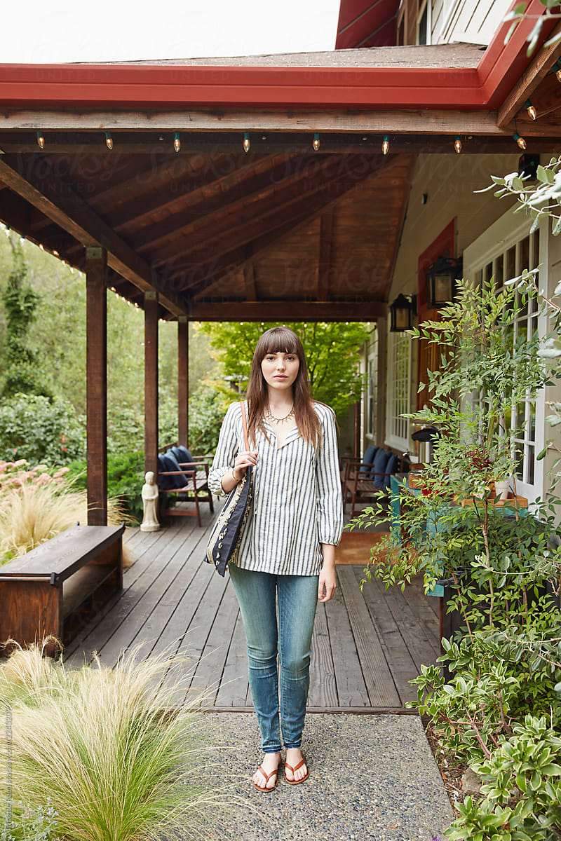"Portrait Of Woman On Front Porch" by Stocksy Contributor "Trinette ...
