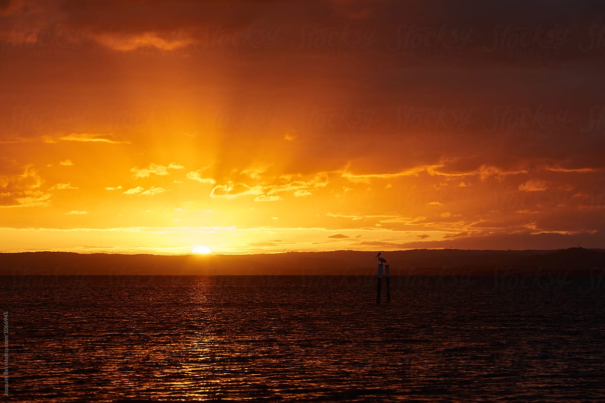 "Dramatic Sunset Over The Sea" by Stocksy Contributor "Joaquim Bel ...