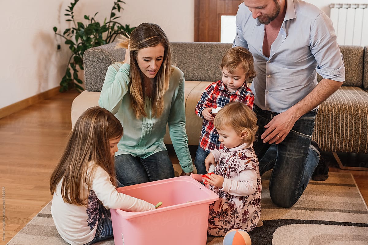"Children And Parents At Home" by Stocksy Contributor "Mauro Grigollo ...