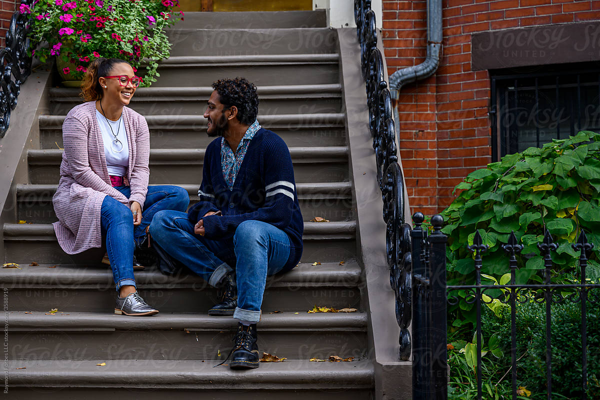 "Laid Back Young African American Couple Talking In The City" by ...