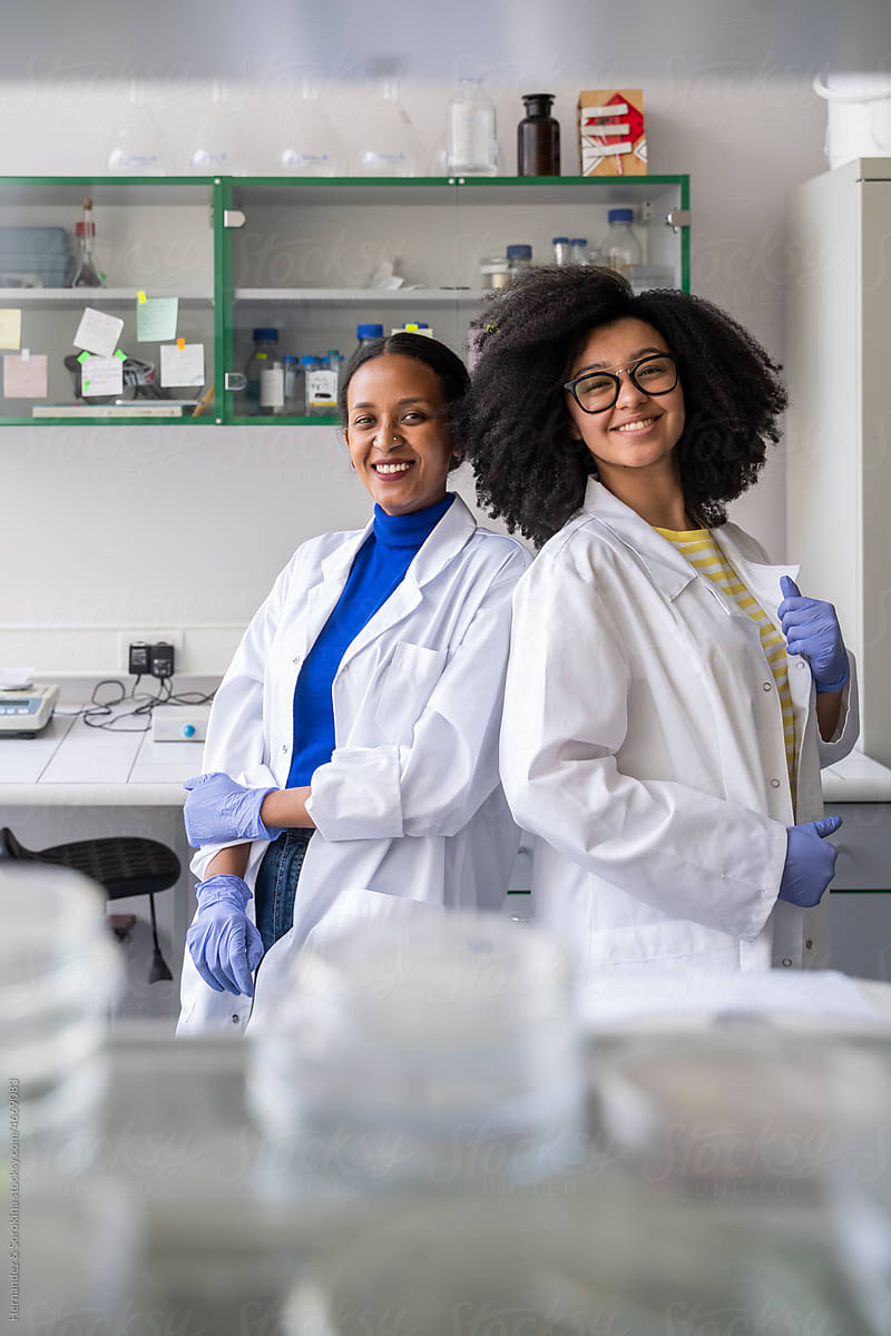 "Portrait Of Two Smiling Female Researchers In Lab" by Stocksy ...