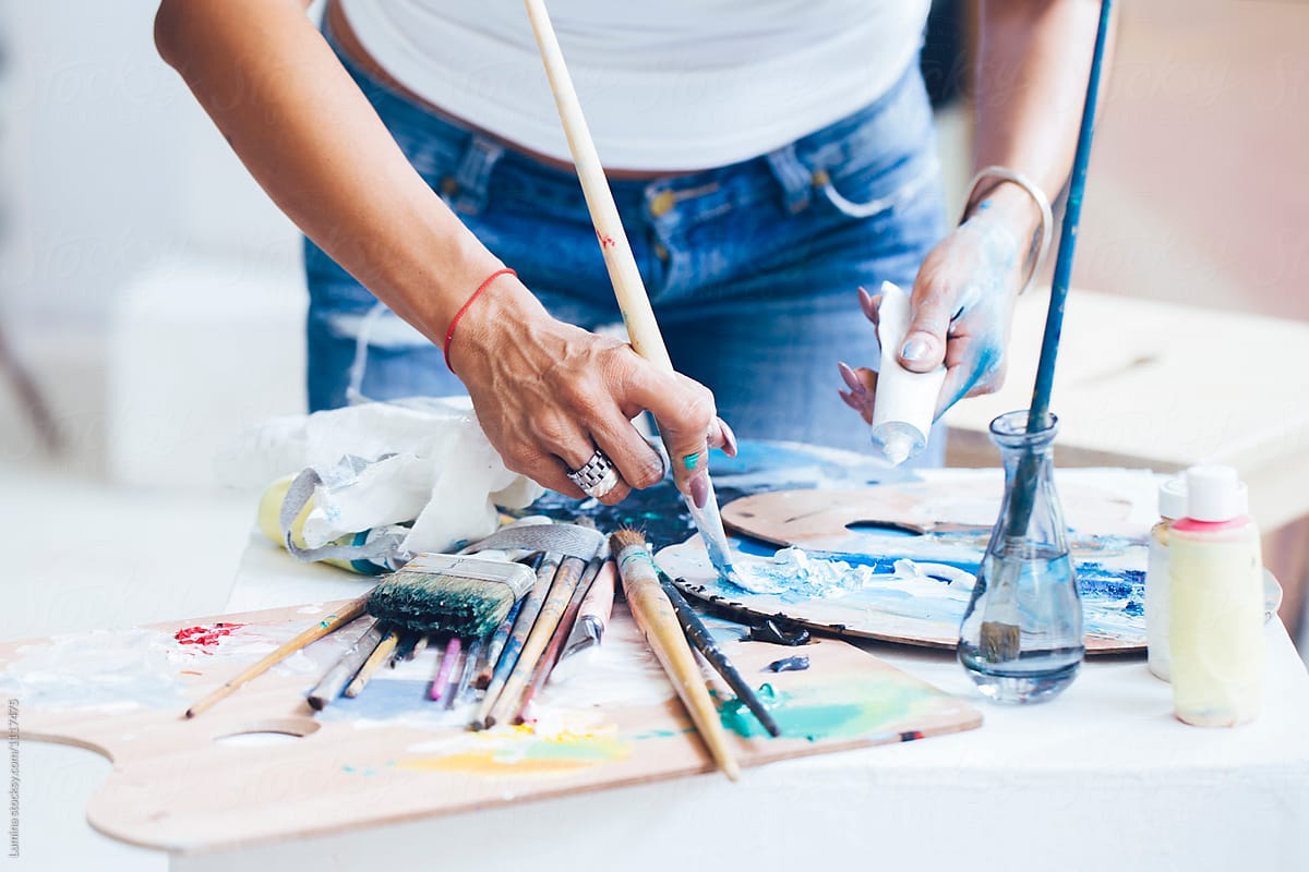 "Woman Artist MIxing Colours" by Stocksy Contributor "Lumina" - Stocksy