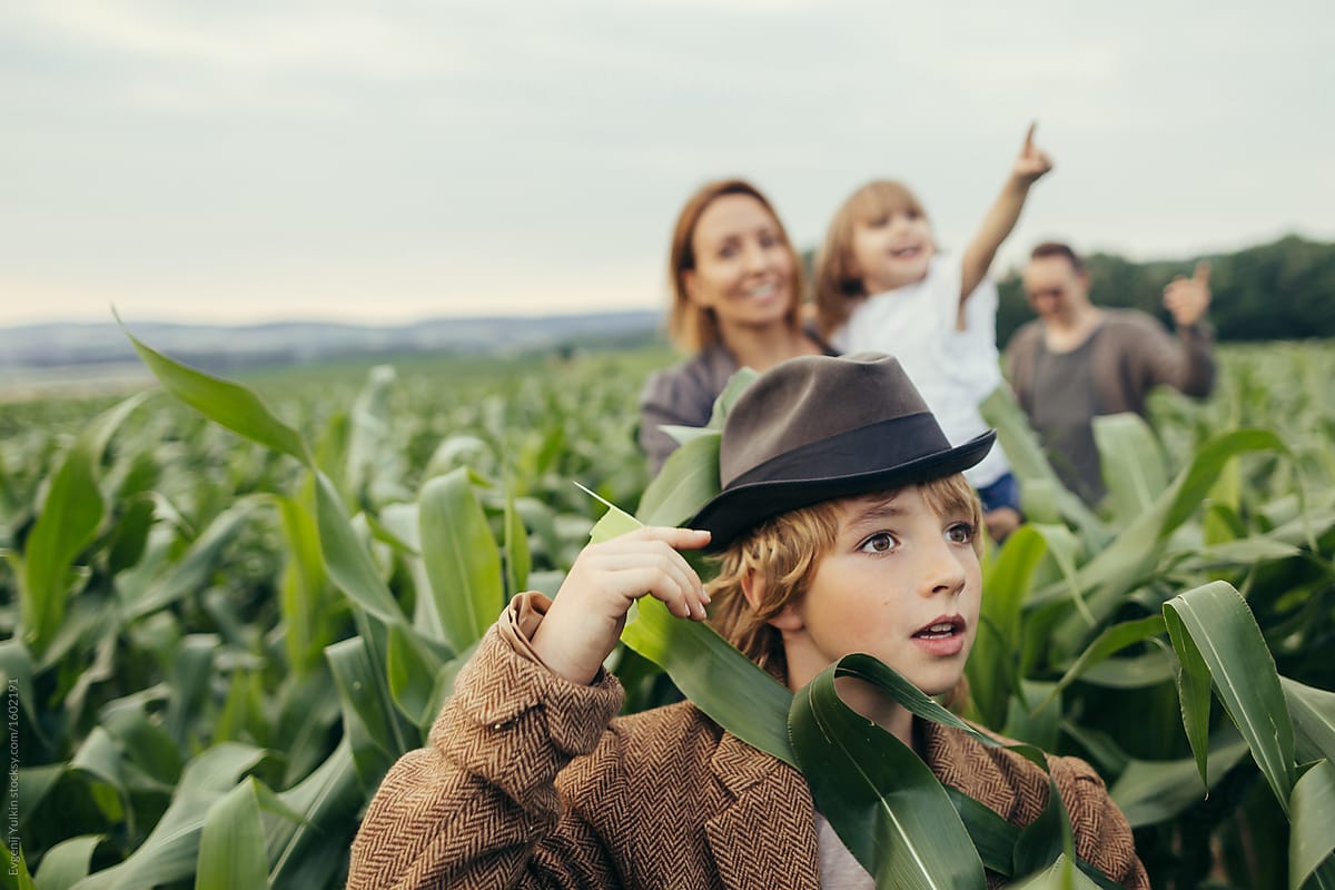 "Rustic Blonde Boy And His Family" by Stocksy Contributor "Evgenij ...
