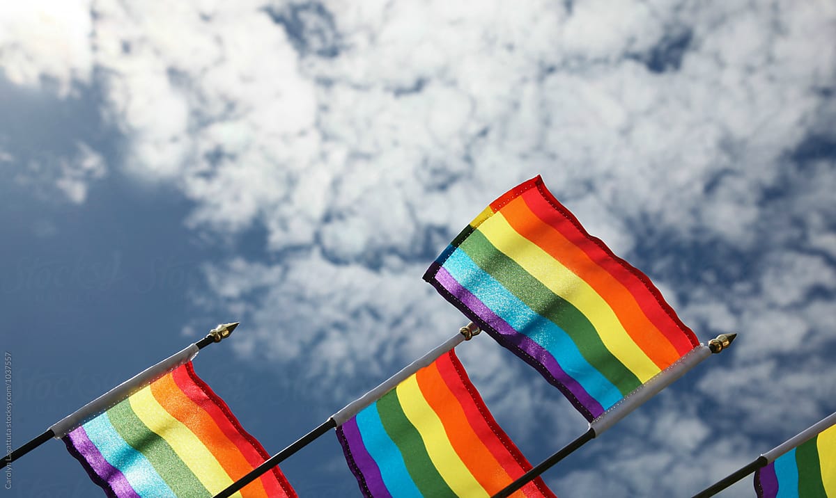 "Rainbow Flags" by Stocksy Contributor "Carolyn Lagattuta" - Stocksy