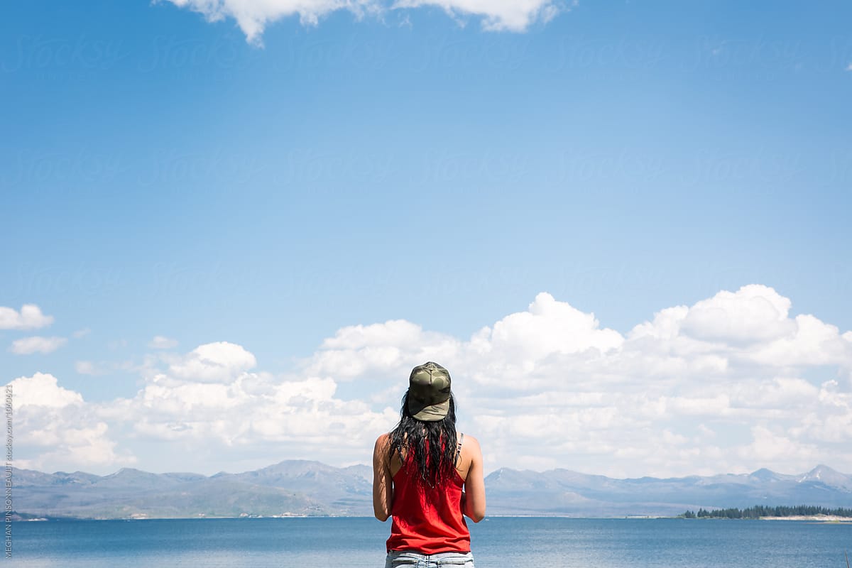 "Young Woman With Blue Sky" by Stocksy Contributor "MEGHAN PINSONNEAULT ...