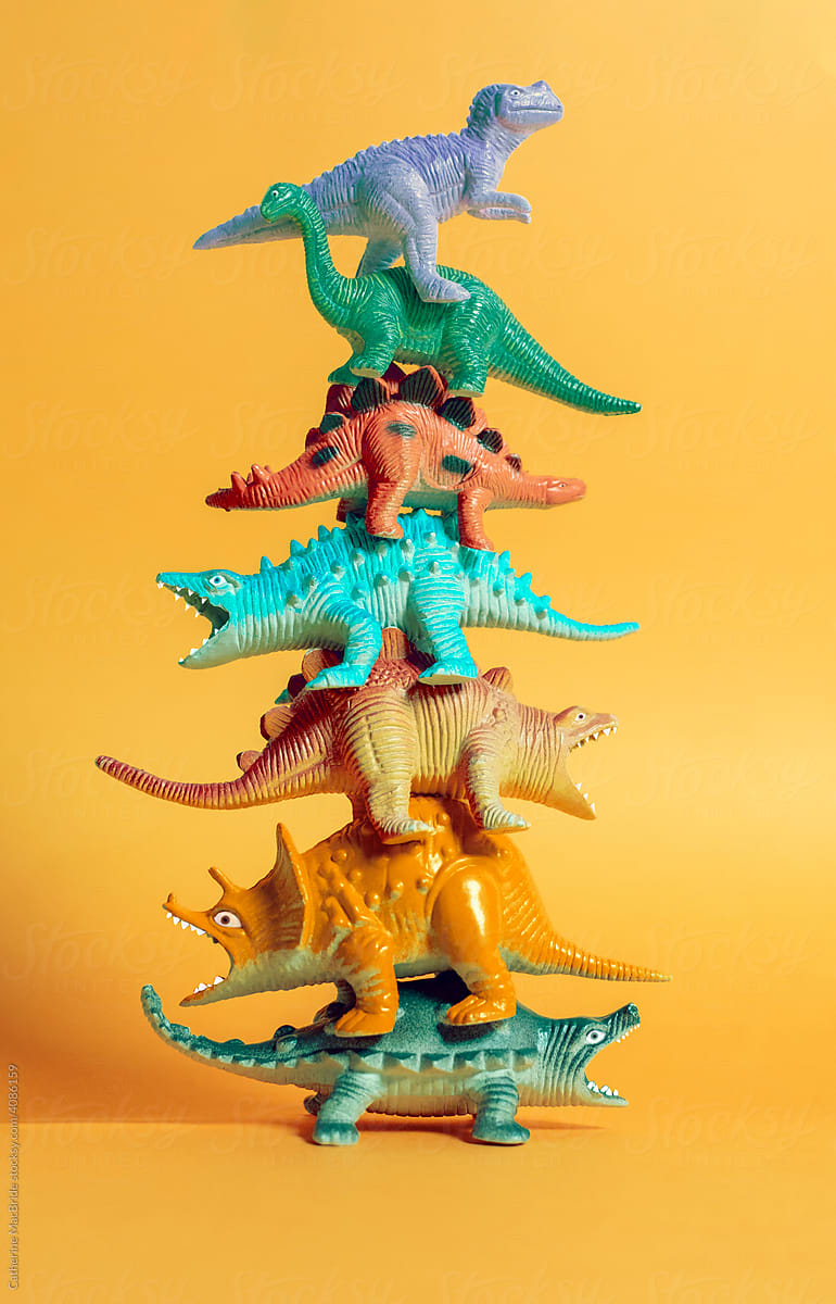 "Pile On, A Stack Of Toy Dinosaurs" by Stocksy Contributor "Catherine ...