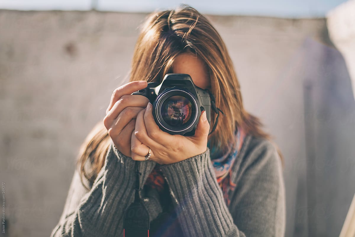 "Young Woman Taking Photos With Her Digital Camera" by Stocksy ...