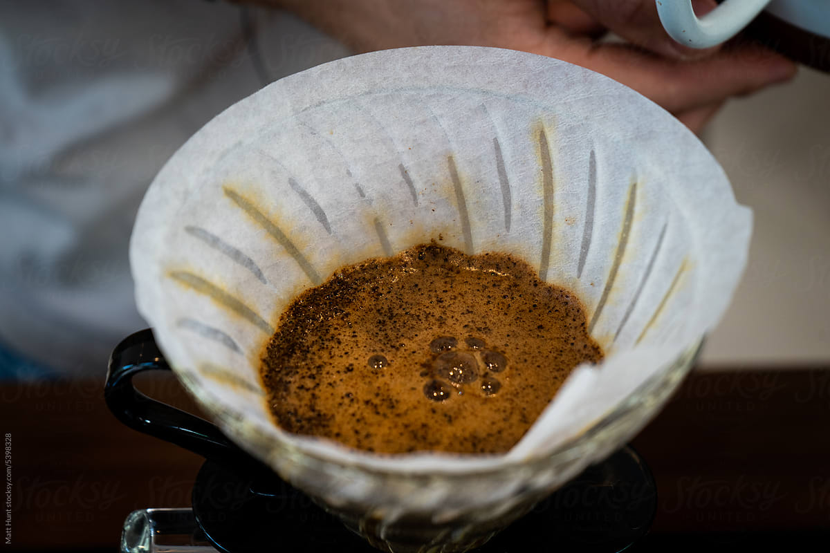 "Hot Water Drips Through Coffee Grounds In A Filter For Pourover Drinks ...