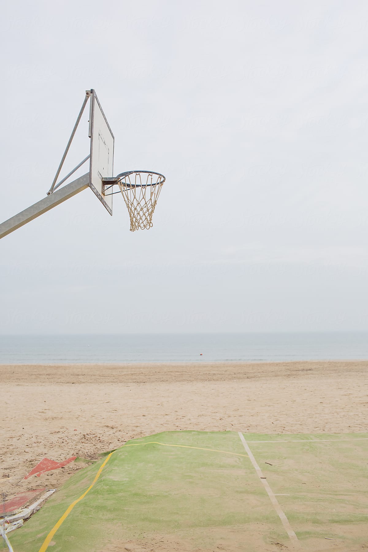 "Basketball Hoop Along The Beach" by Stocksy Contributor "Michela ...