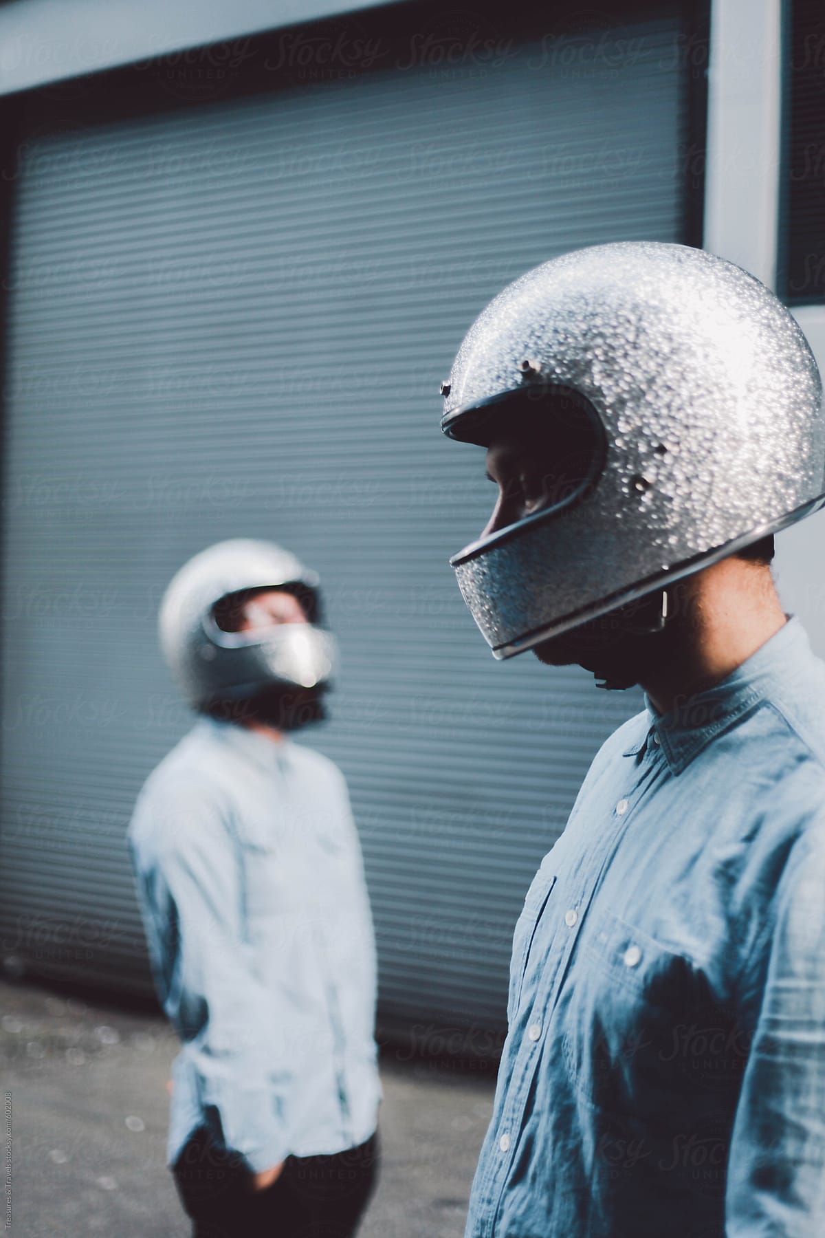 "Two Young Bikers Stand In Alleyway Wearing Motorcycle Helmets" by ...