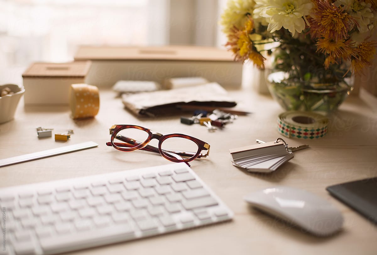 "Glasses On A Desk" by Stocksy Contributor "Lumina" - Stocksy