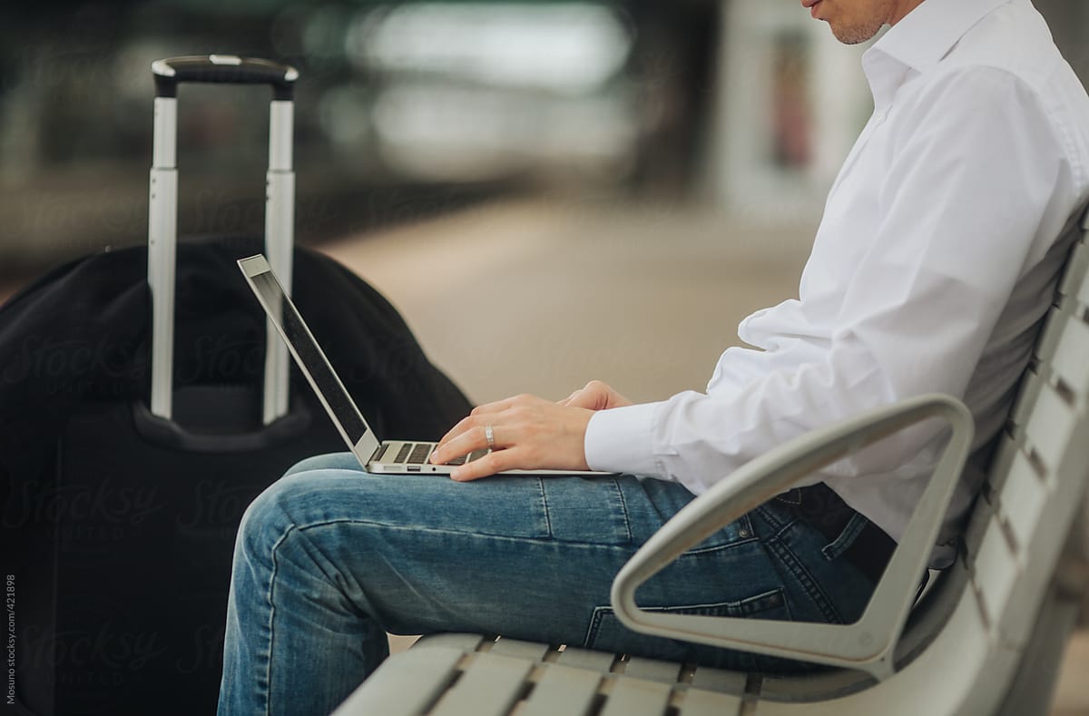 "Man Working While Waiting For The Train" by Stocksy Contributor ...