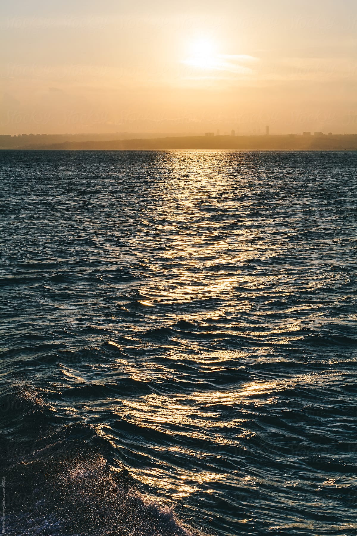 "Splashing Waves On Sunset" by Stocksy Contributor "Borislav Zhuykov ...