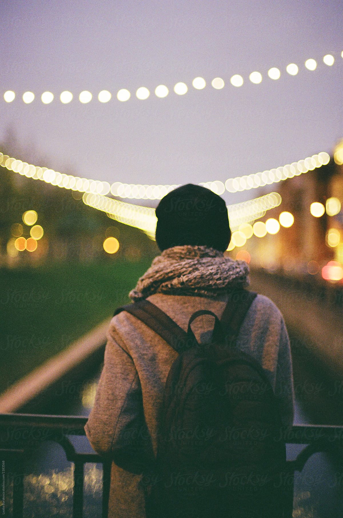 "Back View Of A Woman With Lights" by Stocksy Contributor "Amor ...