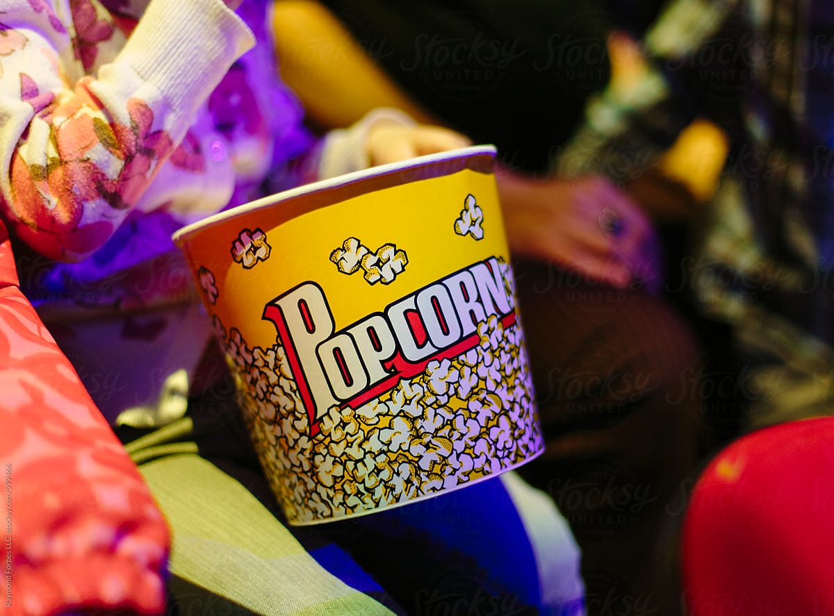 "Popcorn At The Movie Theater" by Stocksy Contributor "Raymond Forbes ...