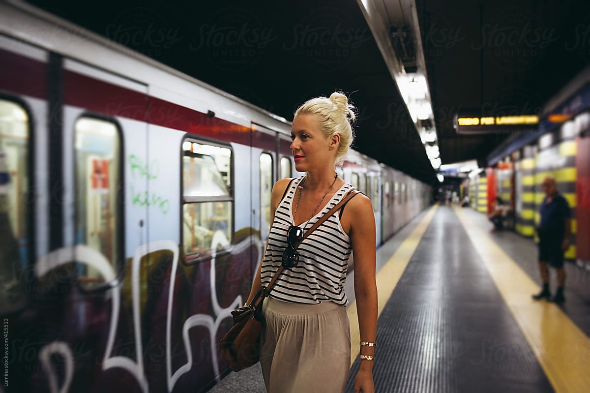 "Blonde Woman On The Subway" by Stocksy Contributor "Lumina" - Stocksy