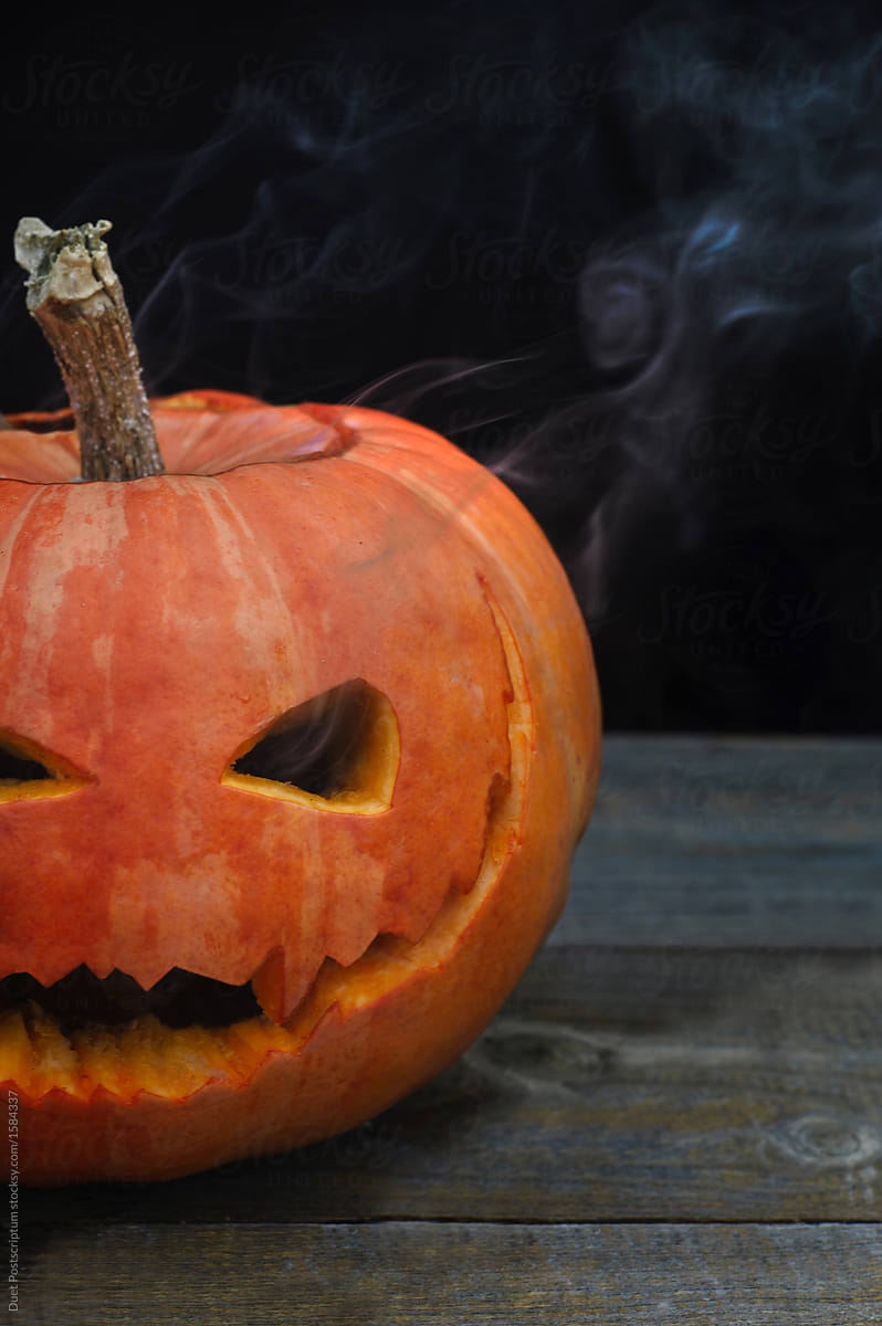 "Smoking Pumpkin Lantern" by Stocksy Contributor "Duet Postscriptum ...