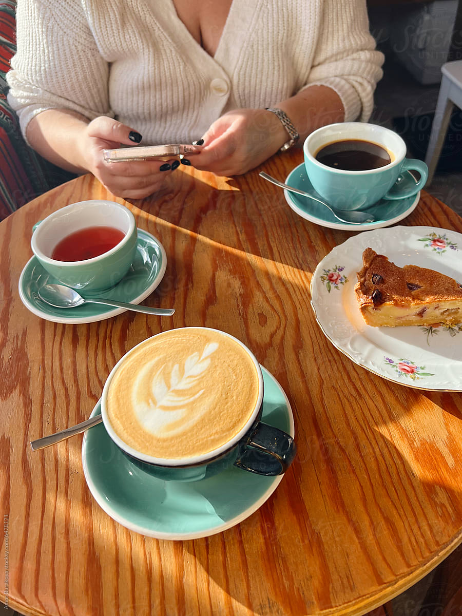 "Table With Three Cups Of Coffee And Tea." by Stocksy Contributor "Amor ...