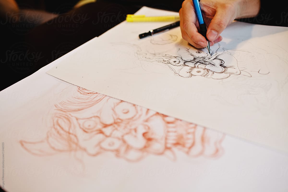 "Anonymous Artist Drawing On Paper" by Stocksy Contributor "Serge ...