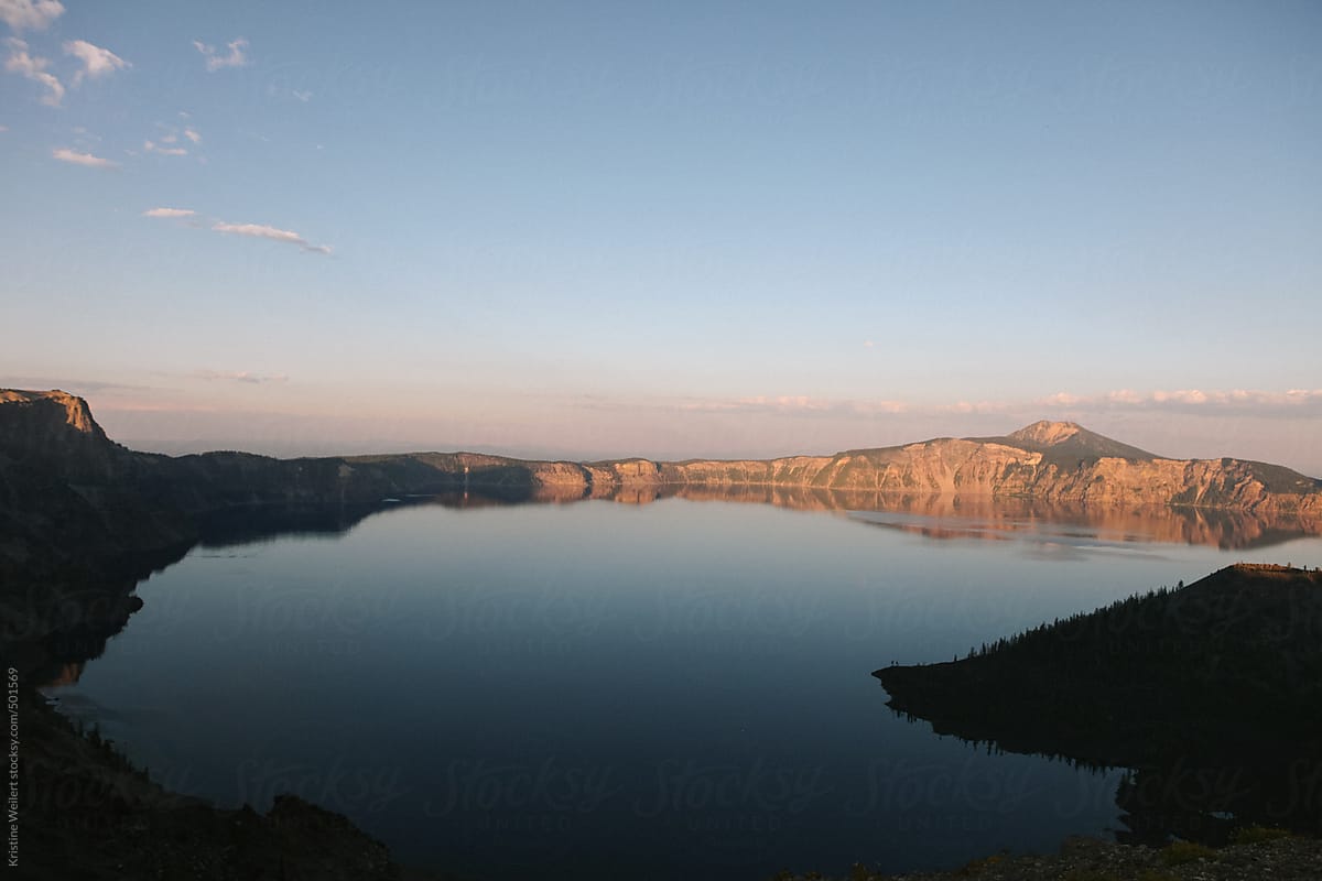 "Crater Lake In Oregon At Sunset" by Stocksy Contributor "Kristine ...