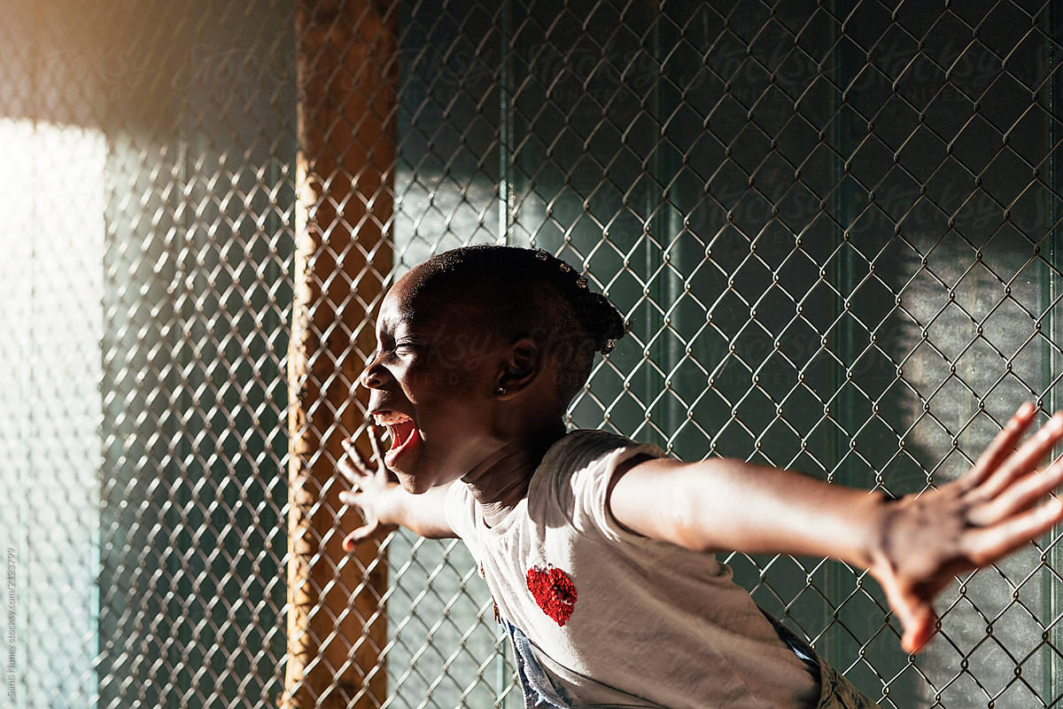 "African Girl Screaming In Fear" by Stocksy Contributor "Santi Nuñez ...