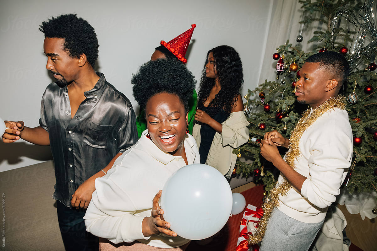 "People Celebrating Christmas" by Stocksy Contributor "Studio Firma ...