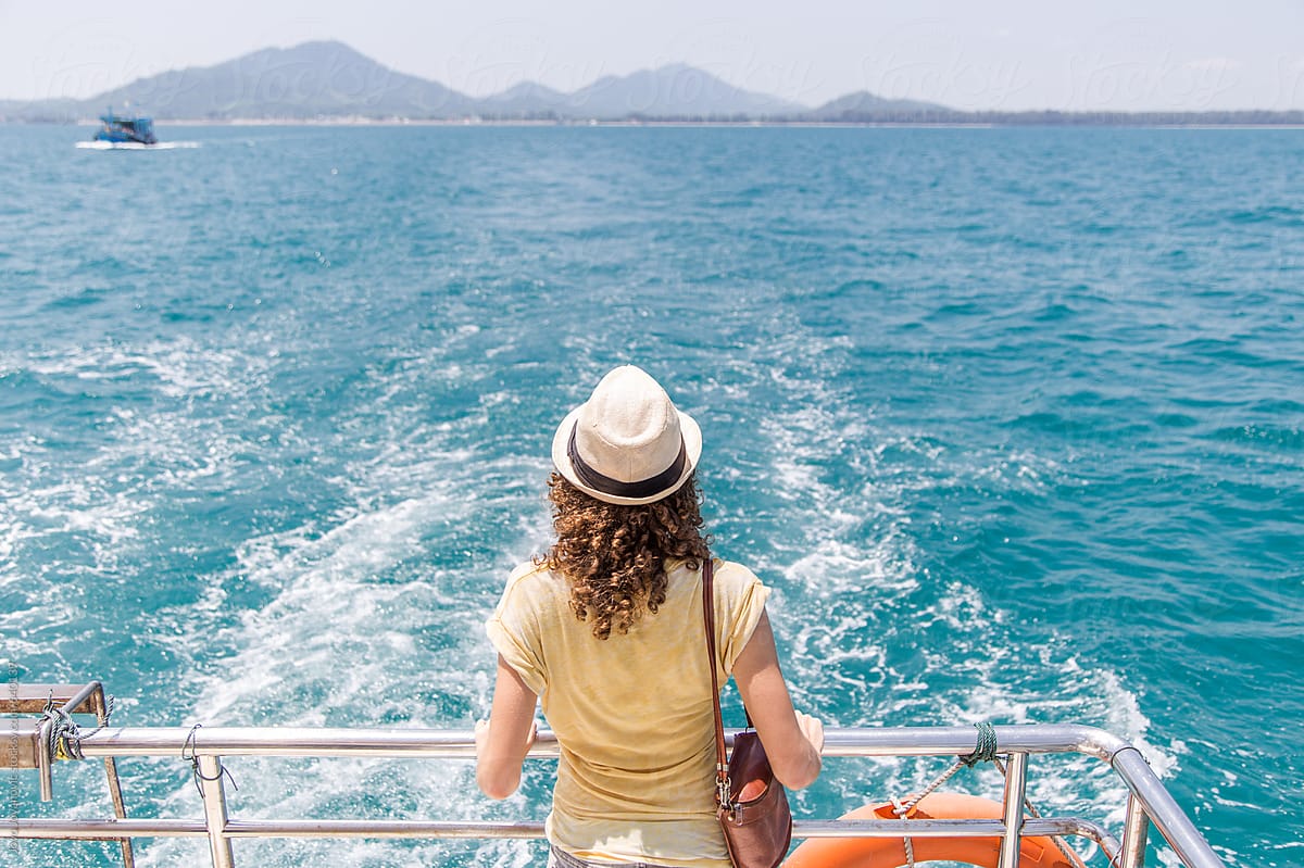 "Woman Looking At The Sea From A Boat" by Stocksy Contributor "Jovo ...