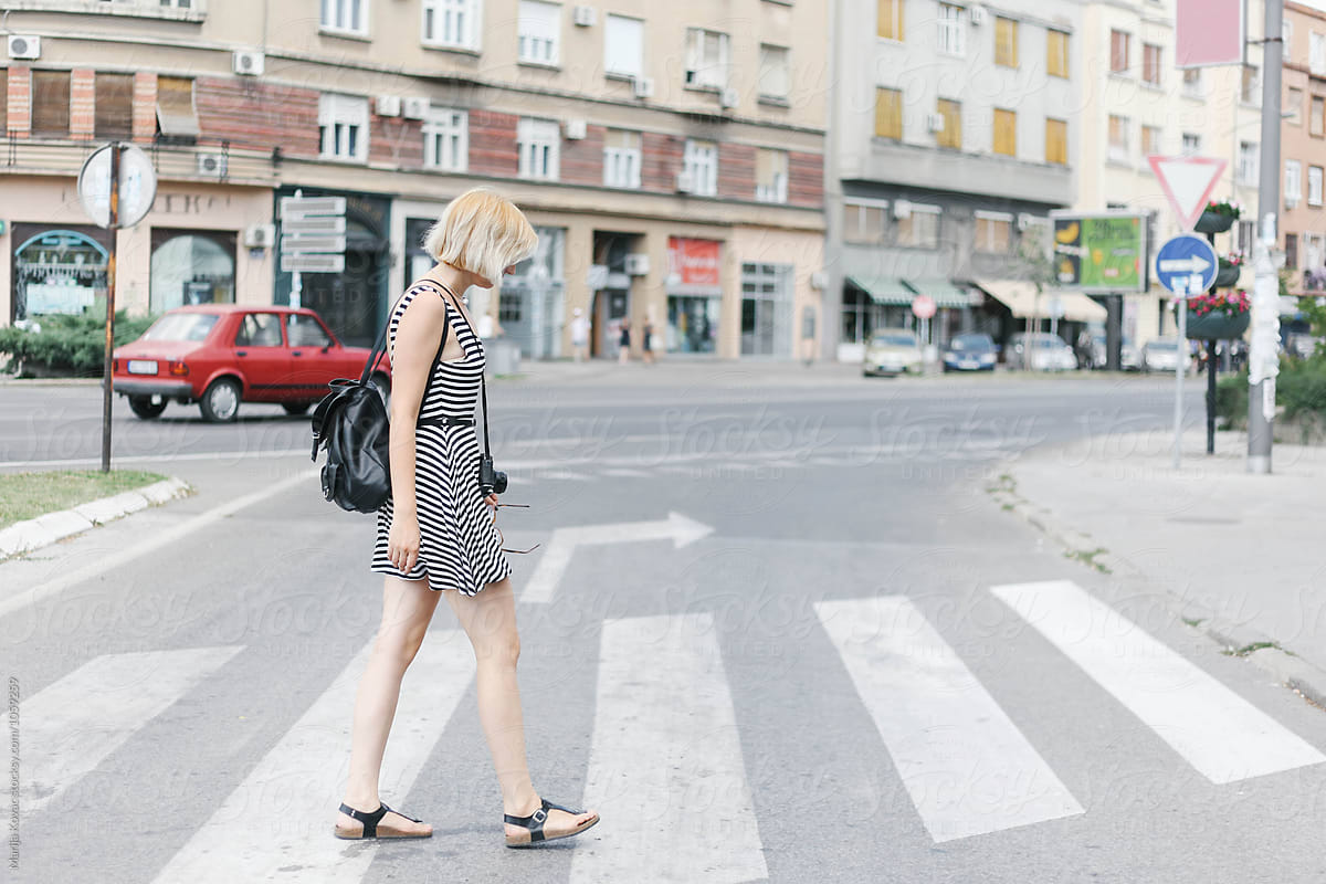 "Blonde Woman Crossing The Street" by Stocksy Contributor "Marija Kovac ...