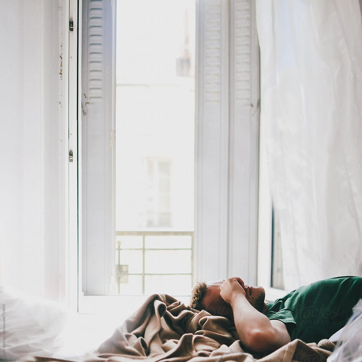 "Young Man Waking Up After A Nap" by Stocksy Contributor "GS Creative ...